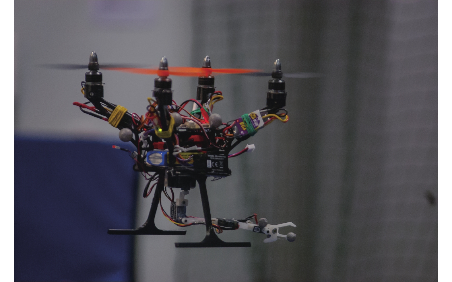 Rotorcraft with a 3DOF Rigid Manipulator: Quaternion-based Modeling and ...