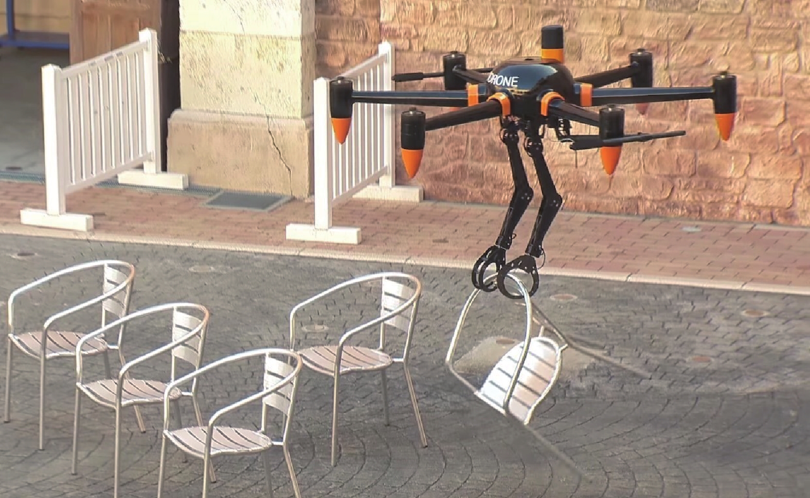 A Review on Cooperative Robotic Arms with Mobile or Drones Bases